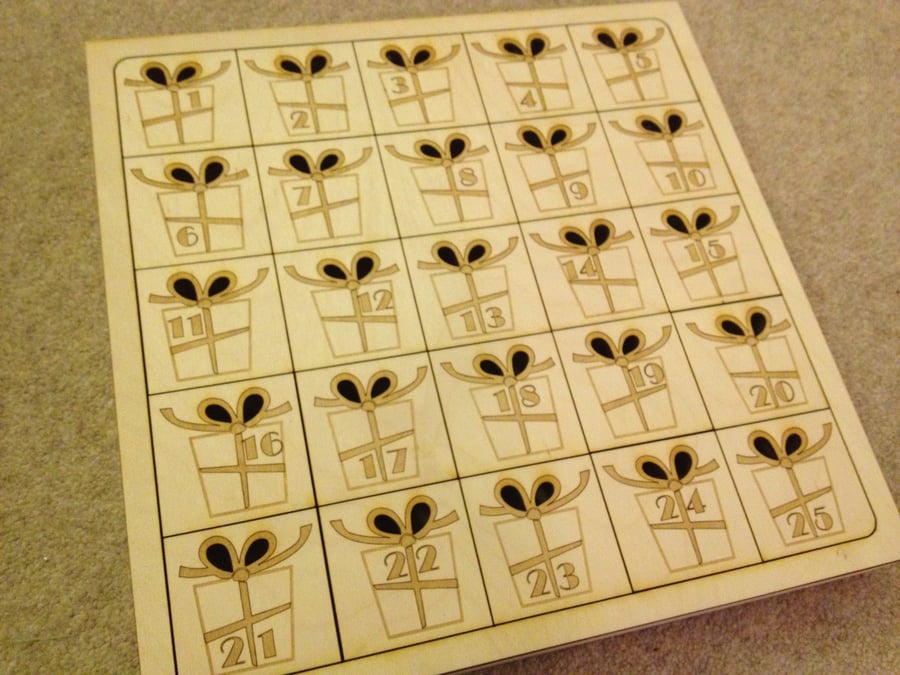 Laser cut 'presents' advent calendar - Folksy