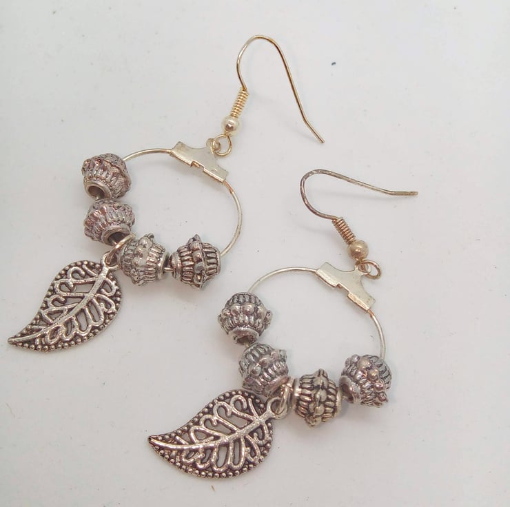 Silver Saturn Spacer and Leaf Charm Earrings fo... - Folksy