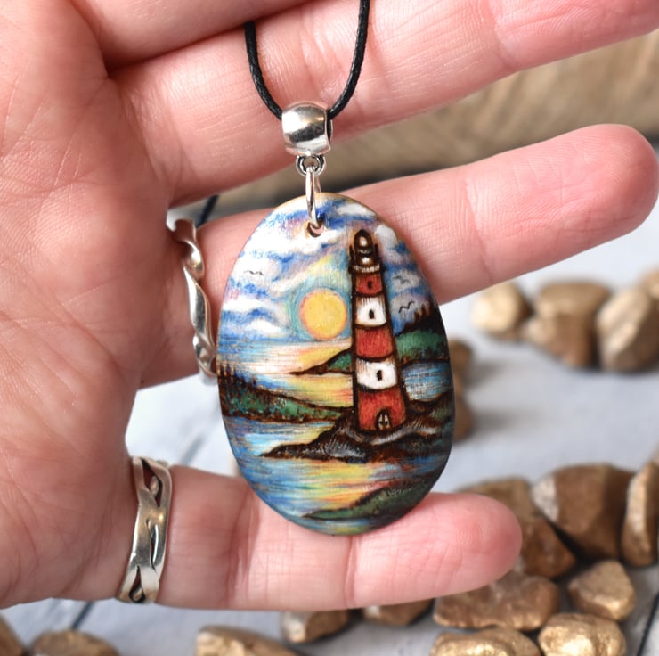 Pyrography lighthouse sunrise wooden pendant. - Folksy