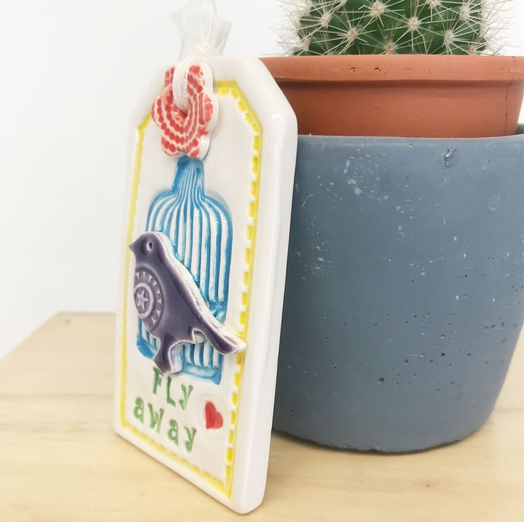 Large decorative pottery tag with bird design g... - Folksy