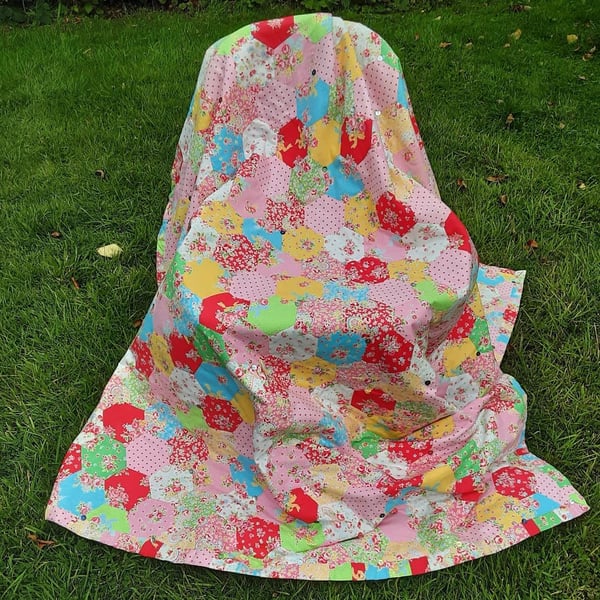 Handmade patchwork quilts on Folksy