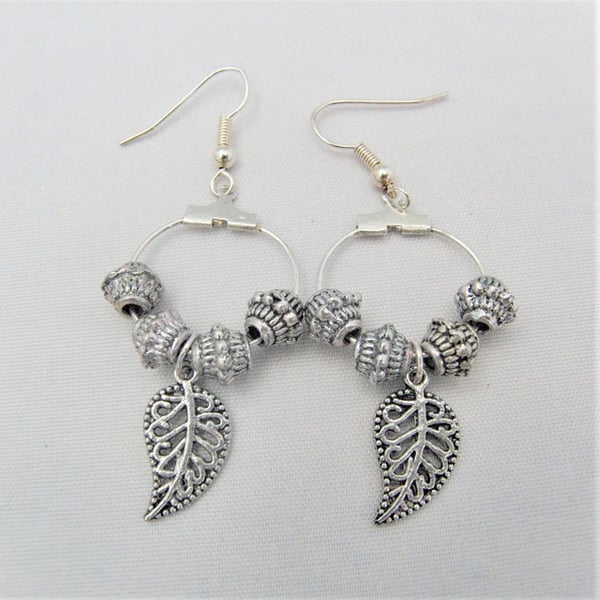 Silver Saturn Spacer and Leaf Charm Earrings fo... - Folksy