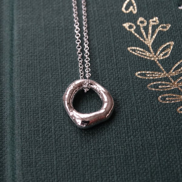 Silver charm pendant - molten silver pendant - Folksy