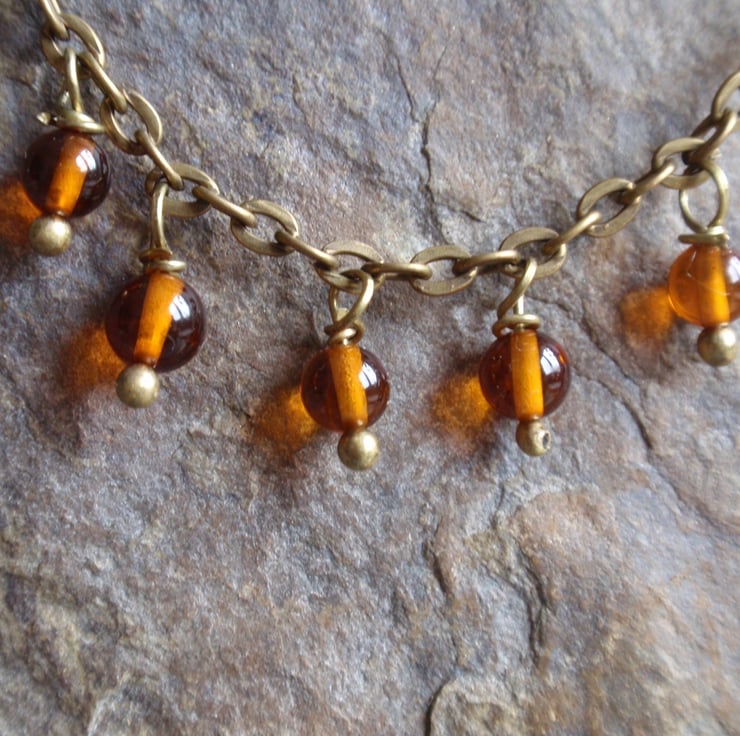 Amber necklace with bronze tone metal chain, au... - Folksy