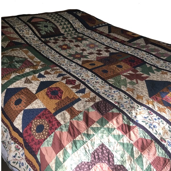 Handmade patchwork quilts on Folksy