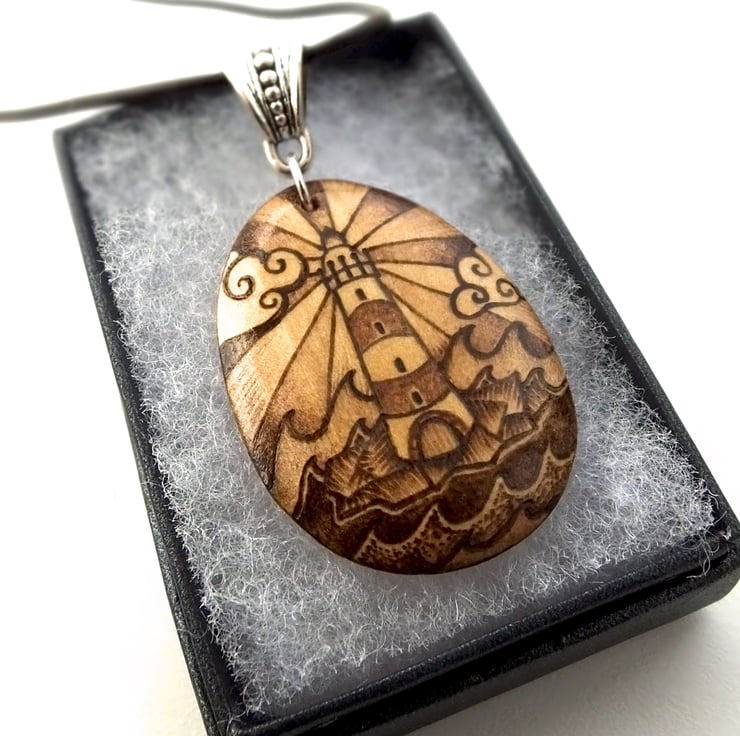 Striking lighthouse shining pyrography pendant ... - Folksy