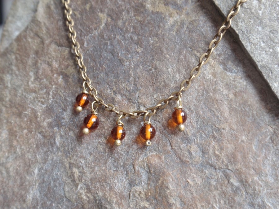 Amber necklace with bronze tone metal chain, au... - Folksy