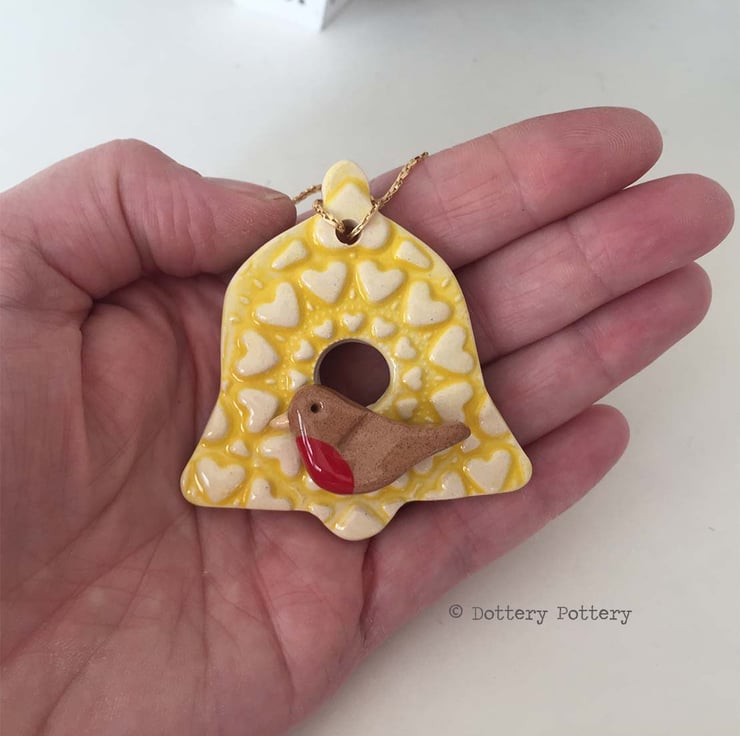 Ceramic Robin sitting on a bell Pottery robin C... - Folksy
