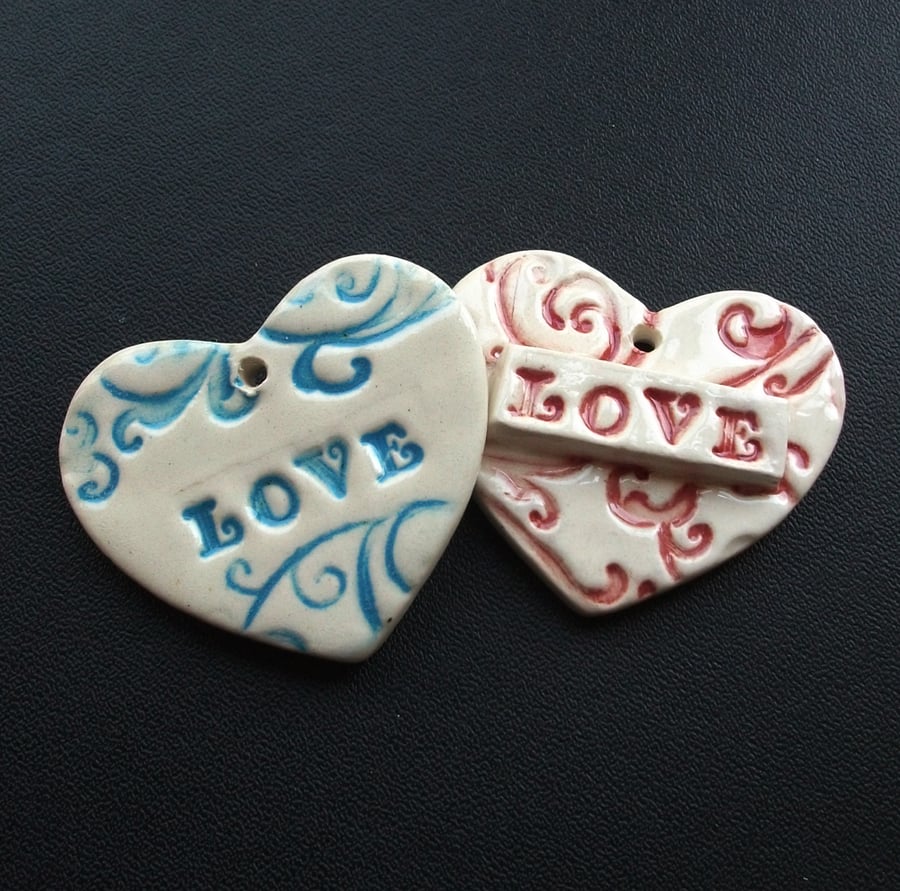 Set of two ceramic LOVE heart pendants - Folksy