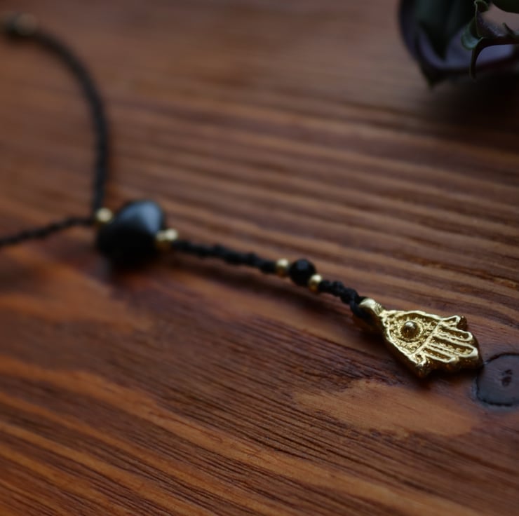 Necklace with onyx and Hamsa hand brass char - Folksy
