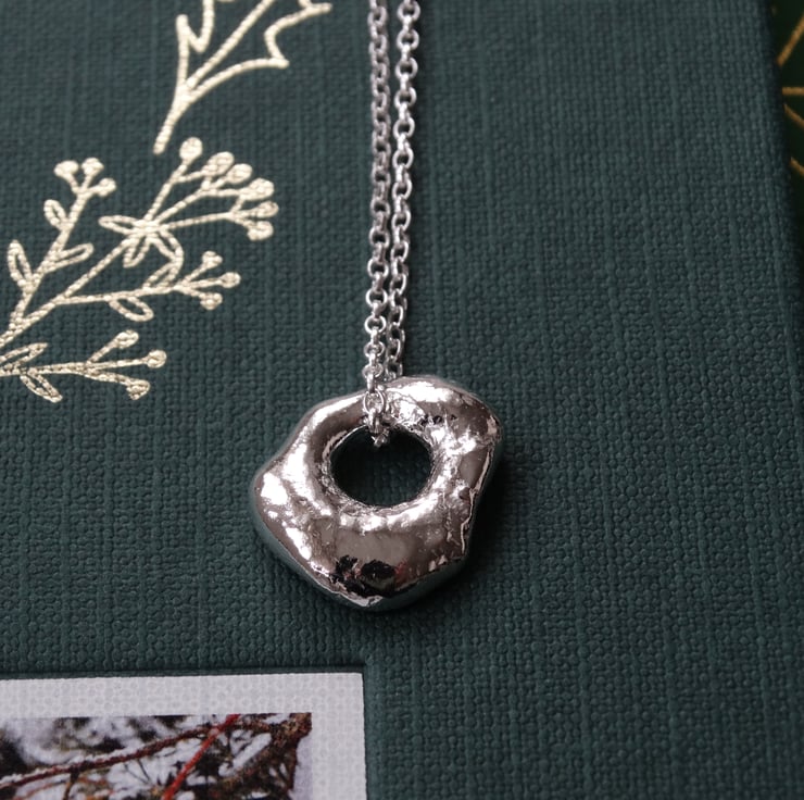 Silver hag stone pendant - molten silver nugget... - Folksy