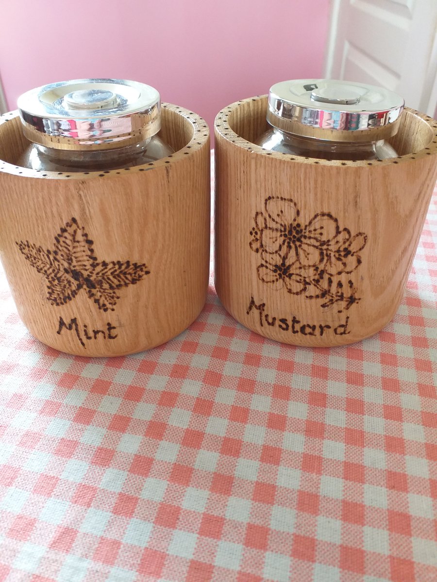 Two condiments jars set in wood - Folksy
