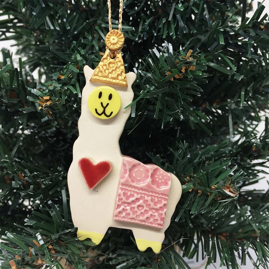 Pottery llama hanging decoration Llama in a par... - Folksy