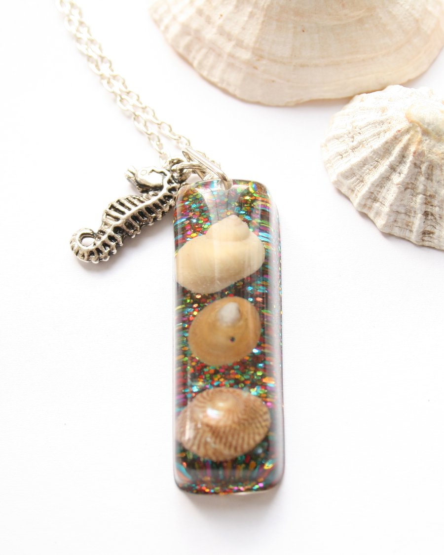 Three pretty shells in resin. - Folksy
