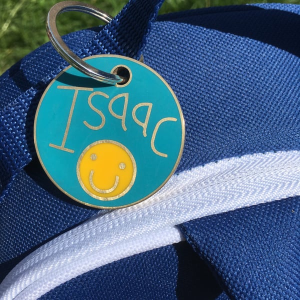 A personalised bag tag in resin and metal - Folksy