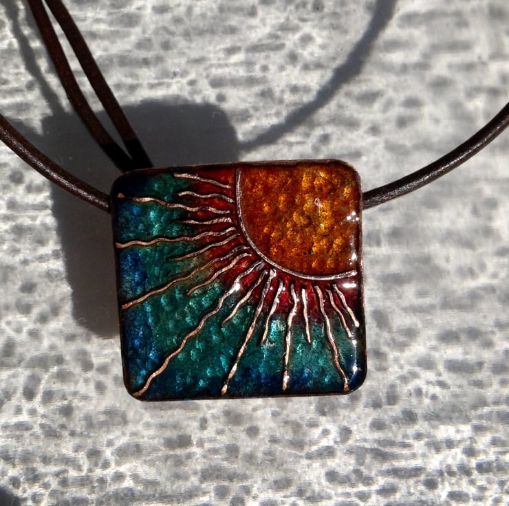 Sunburst enamelled square pendant on leather - Folksy