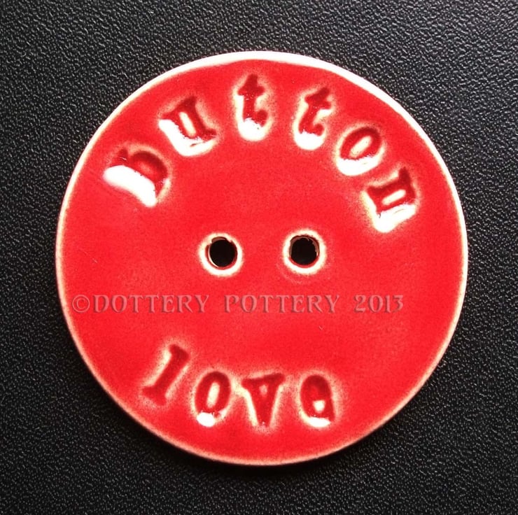 large red ceramic button. Button love - Folksy