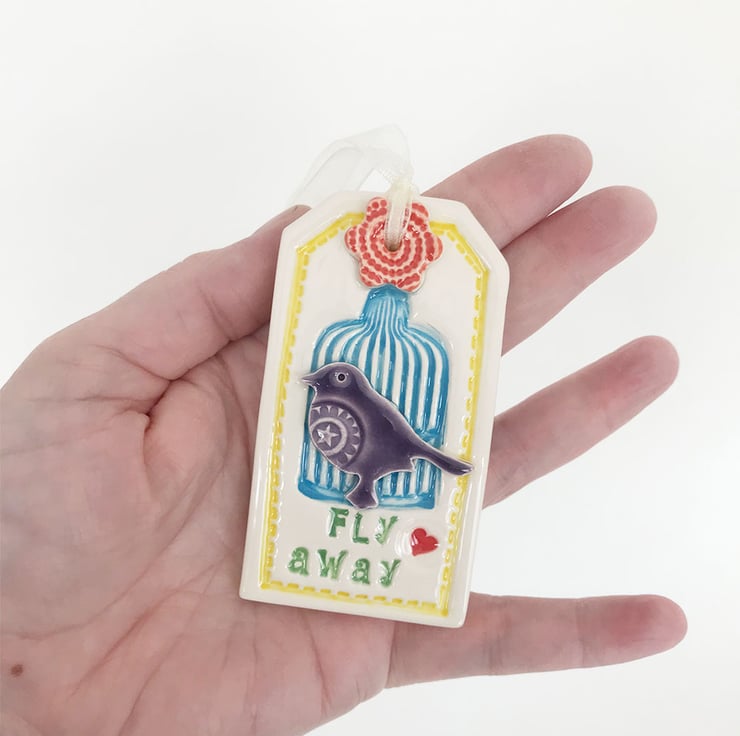 Large decorative pottery tag with bird design g... - Folksy