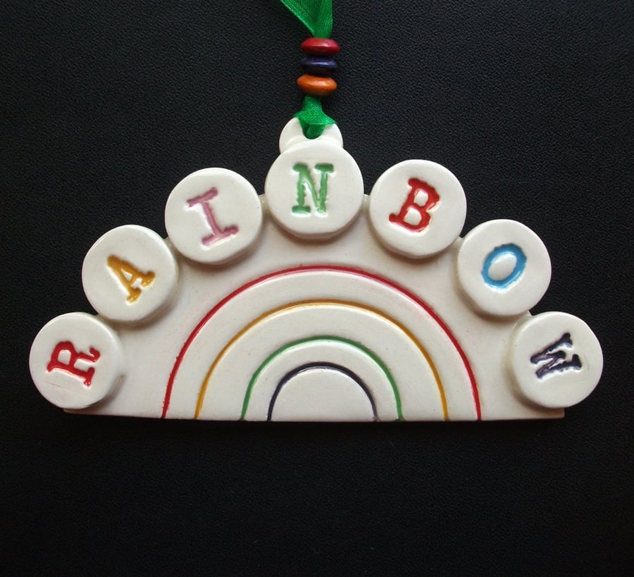 Ceramic rainbow hanging decoration - Folksy