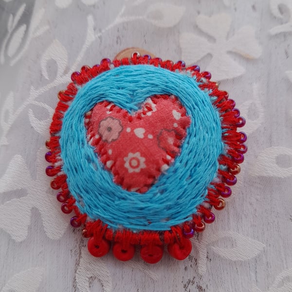 Handmade textile brooches on Folksy