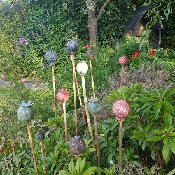 Pottery seed head cane toppers - Folksy