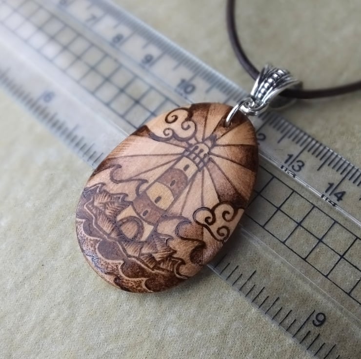 Striking lighthouse shining pyrography pendant ... - Folksy