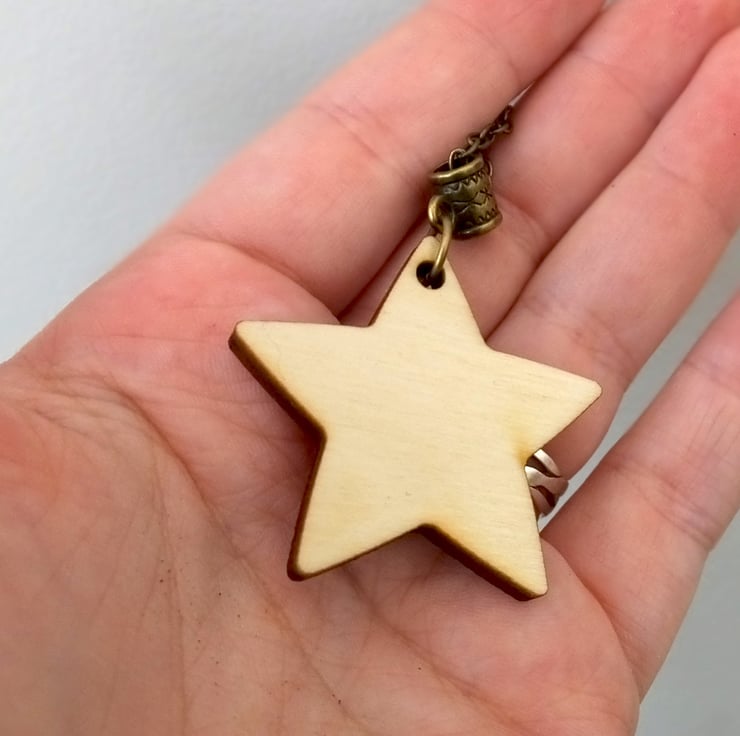 Pyrography star pendant, with a dandelion clock... - Folksy