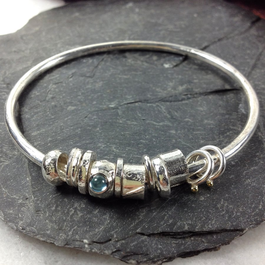 Silver blue topaz and gold bangle No Worries B... - Folksy
