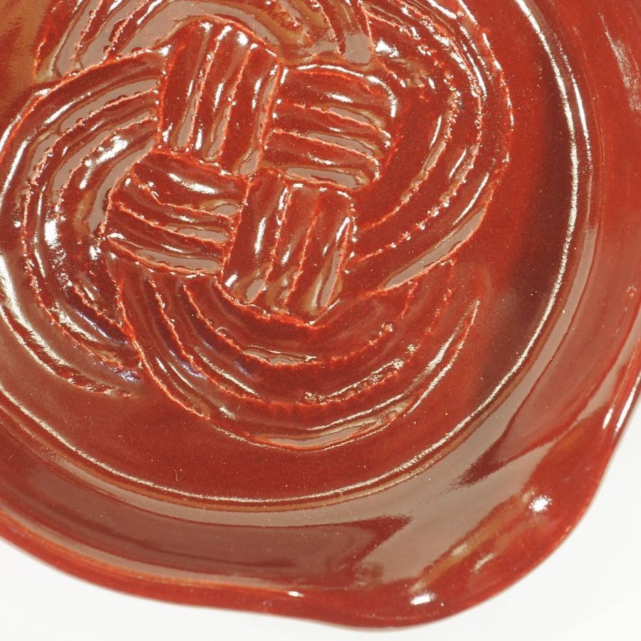 Red handmade ceramic spoonrest with knot design - Folksy