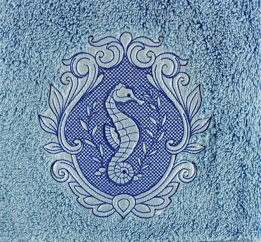 Seahorse embossed in blue embroidery thread on ... - Folksy