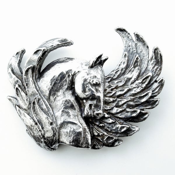 Sterling silver handmade brooches on Folksy