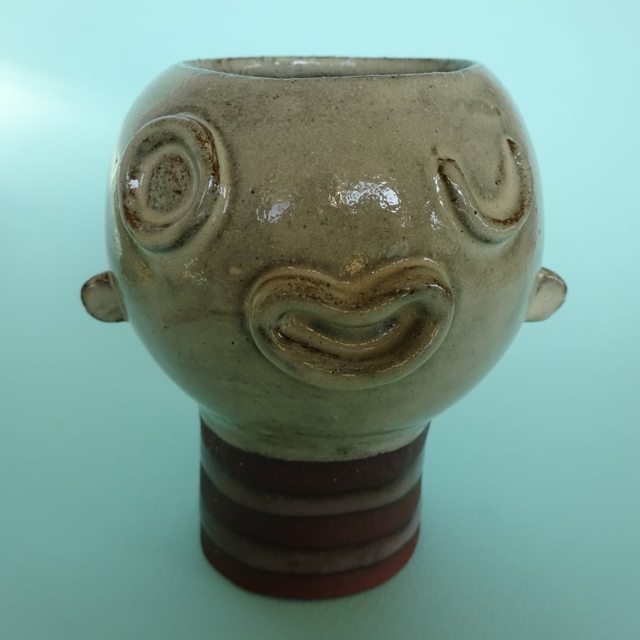 Ceramic face pot with winking eye - Folksy