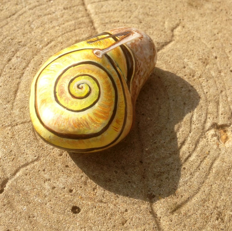 Snail hand painted on stone - Folksy