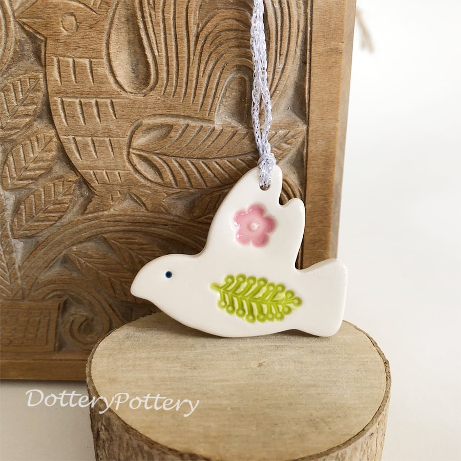 Teeny ceramic dove decoration with fancy leaf a... - Folksy