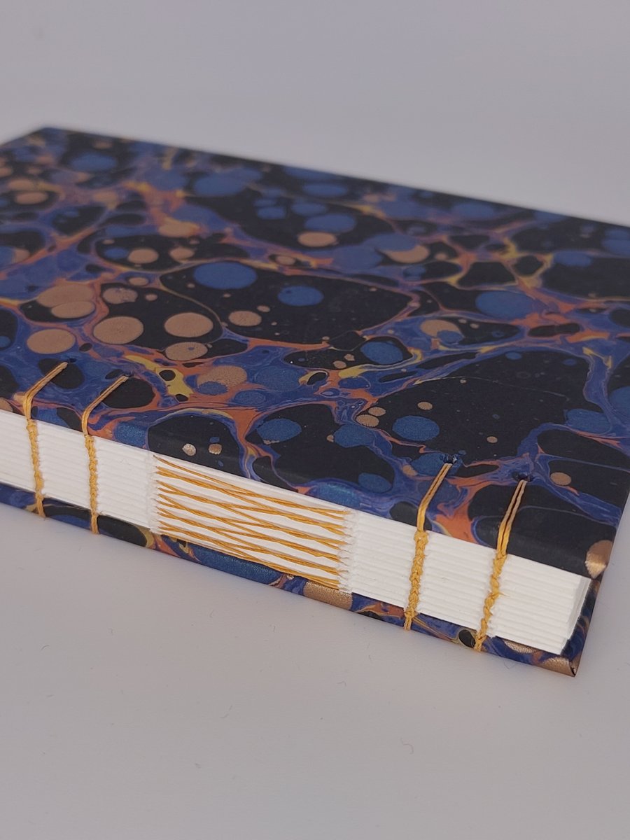 Handcrafted A6 coptic stitch notebook with recy... - Folksy