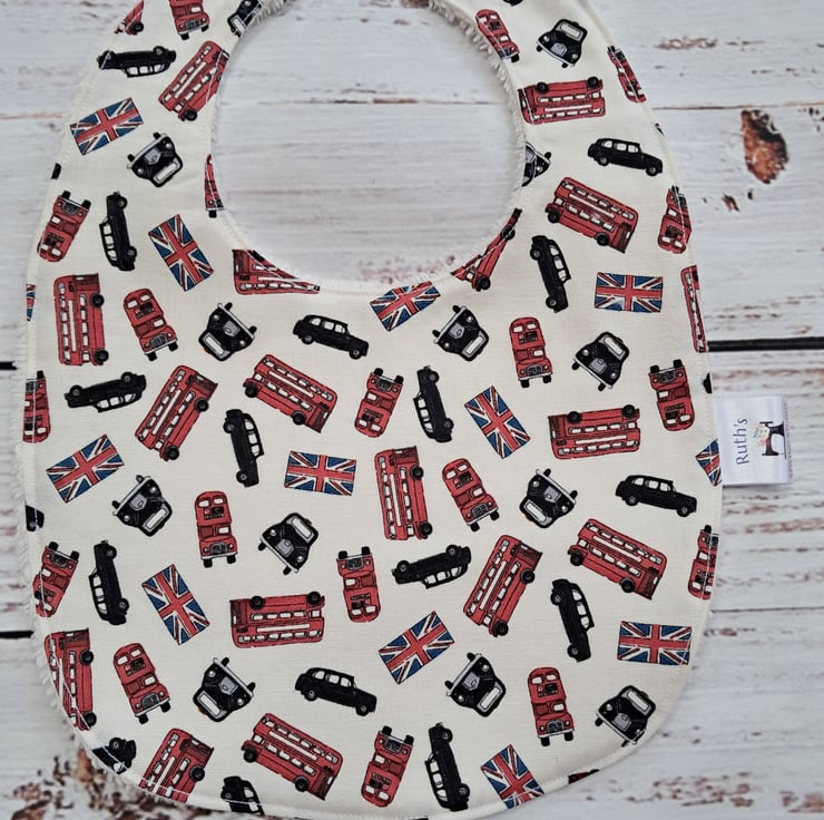 Newborn baby bib with London cabs and buses theme - Folksy