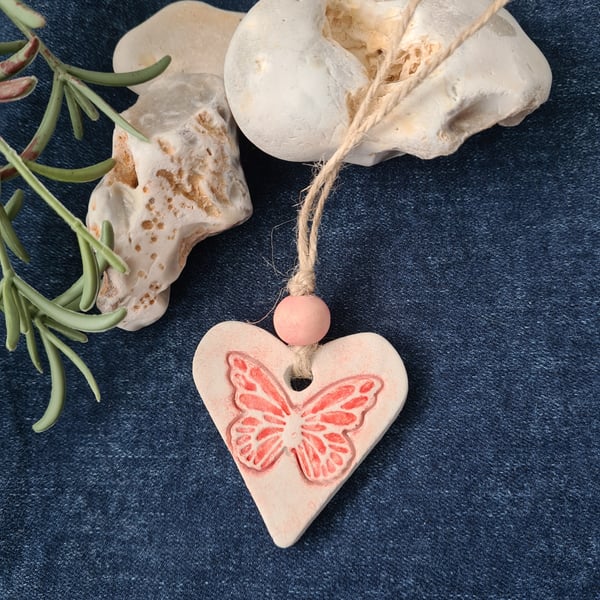 Clay red butterfly embossed hanging decoration ... - Folksy