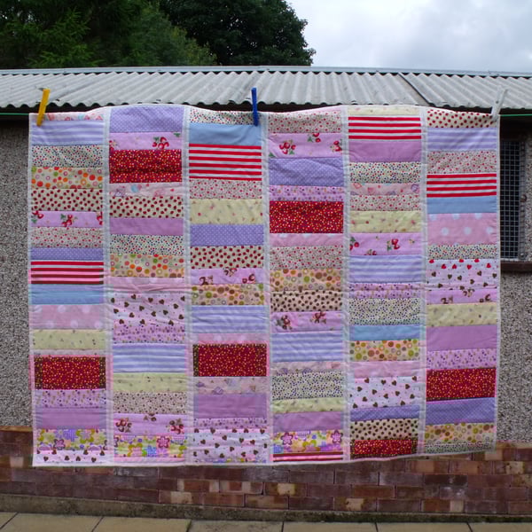 Handmade patchwork quilts on Folksy