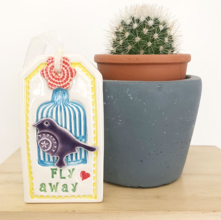 Large decorative pottery tag with bird design g... - Folksy