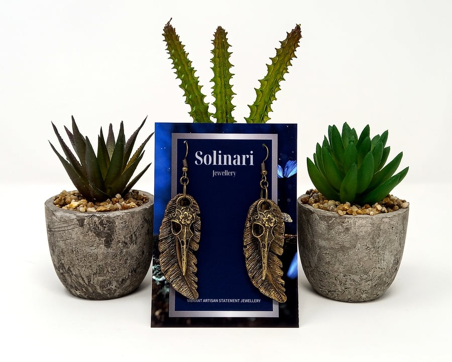 Bird skull and feather statement earrings in an... - Folksy