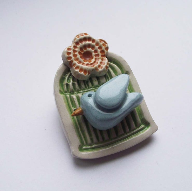 Little ceramic bird cage brooch with flower. Po... - Folksy