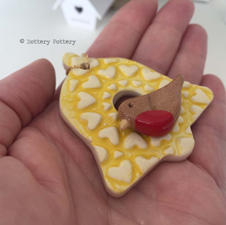 Ceramic Robin sitting on a bell Pottery robin C... - Folksy