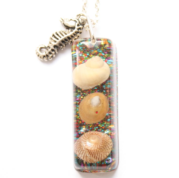 Three pretty shells in resin. - Folksy