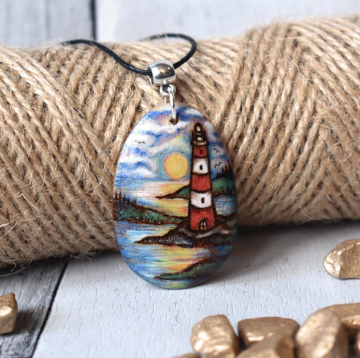 Pyrography lighthouse sunrise wooden pendant. - Folksy