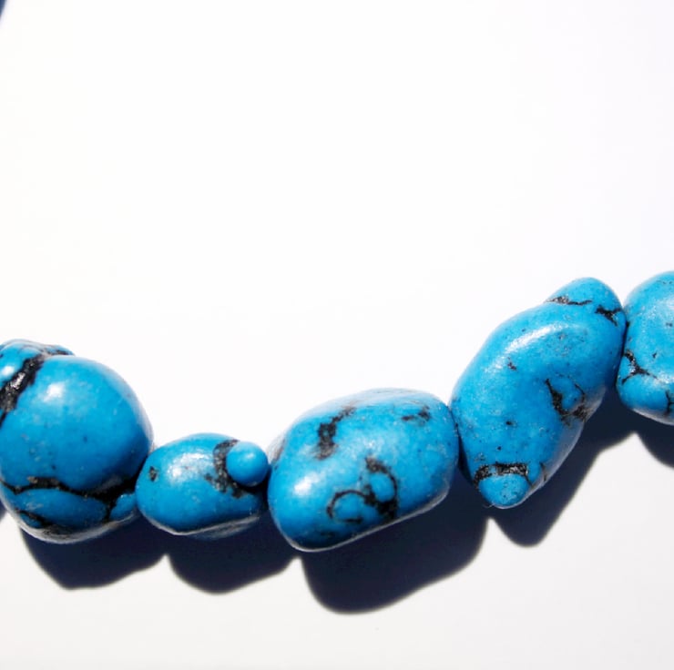 Dyed turquoise howlite gemstone chunks elastica... - Folksy