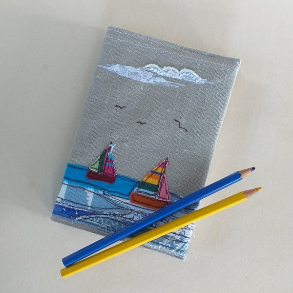 A6 Notebook with an Embroidered Seascape on a R... - Folksy