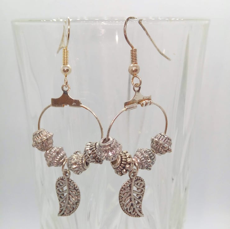 Silver Saturn Spacer and Leaf Charm Earrings fo... - Folksy