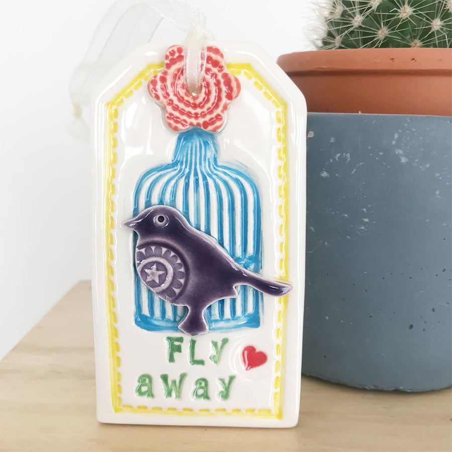 Large decorative pottery tag with bird design g... - Folksy