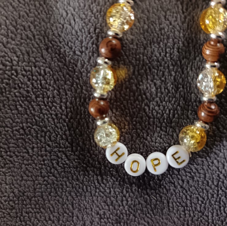Elasticated "hope" bead bracelet with... - Folksy