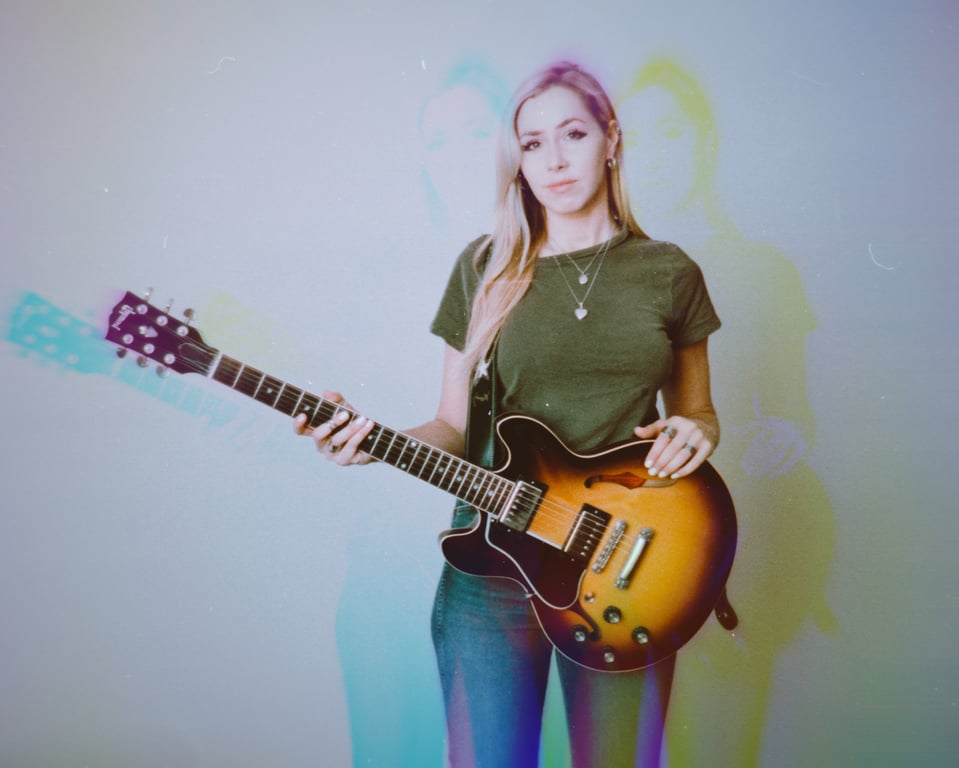 Online Guitar Lessons with Arianna Powell - Til